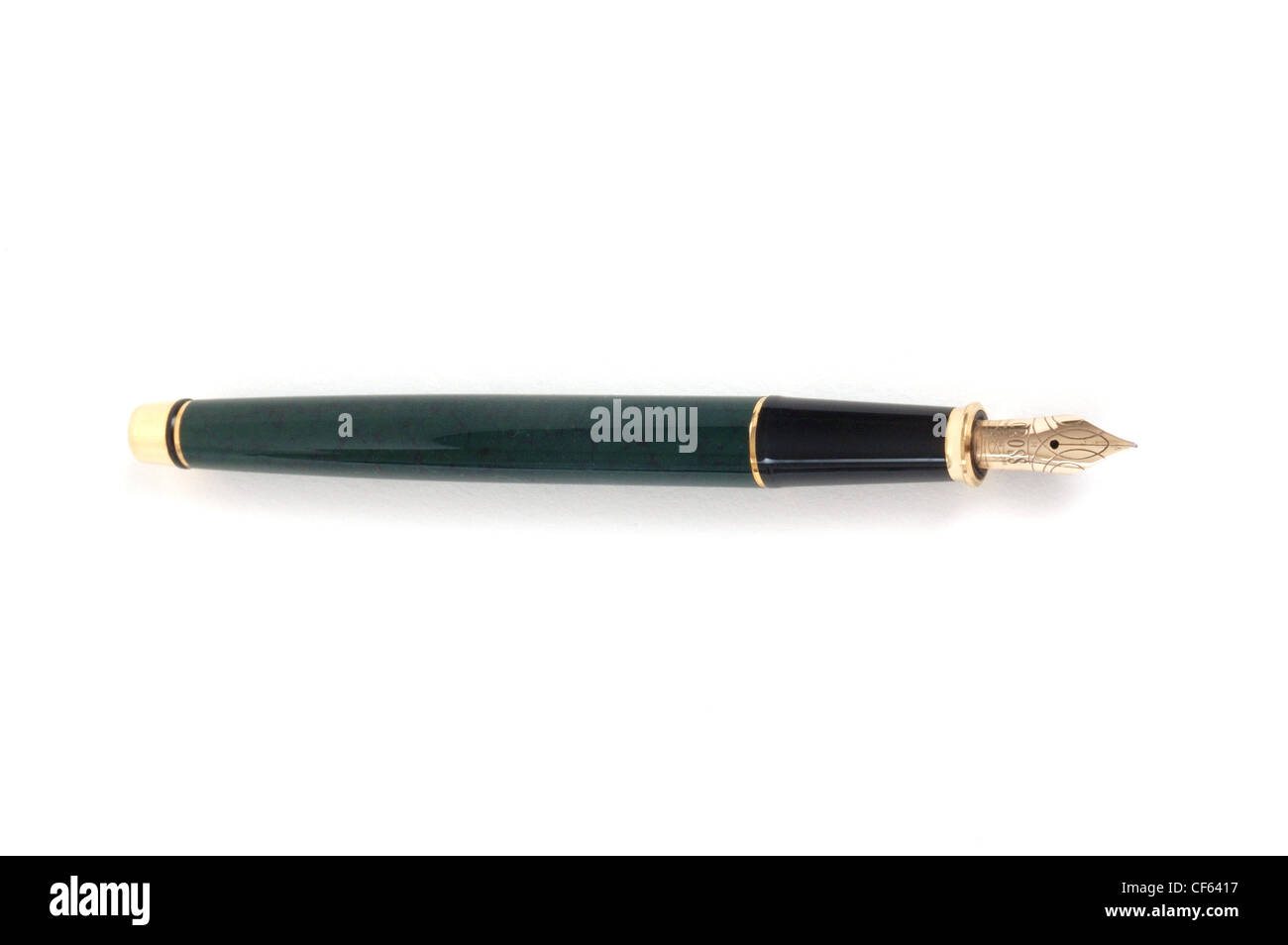 A black and gold fountain pen with the lid off Stock Photo - Alamy