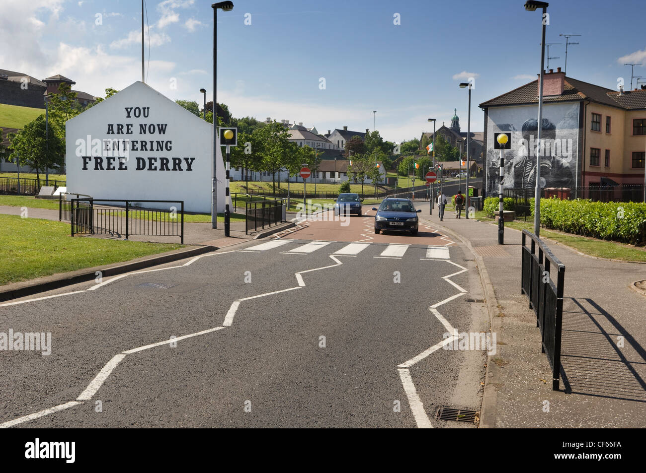 Writing on the side of a house in Free Derry Corner that reads 'You Are ...