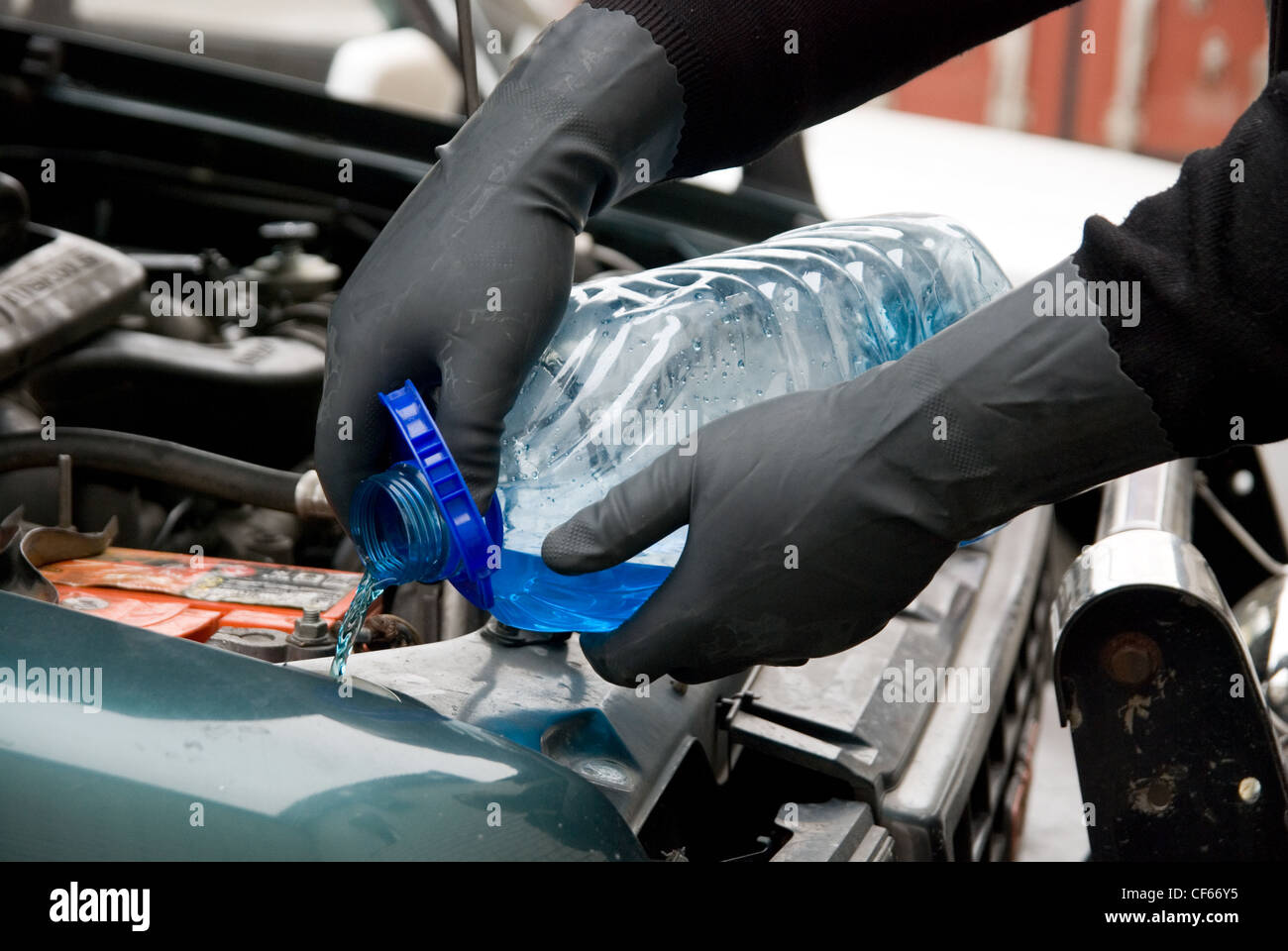 Mechanic fills hi-res stock photography and images - Alamy