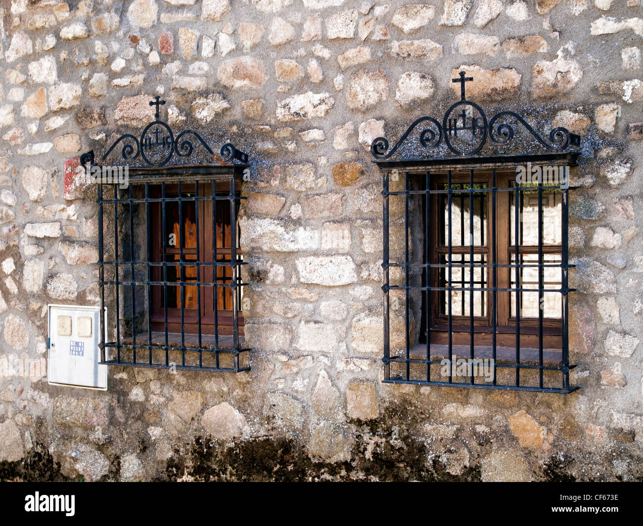 Two old windows with christian cross in grille Stock Photo - Alamy