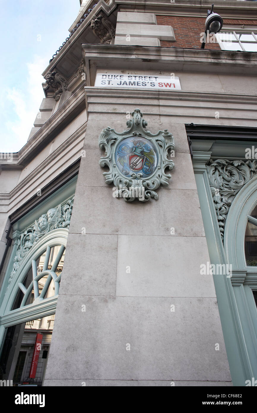 Fortnum & Mason emblem and street sign. Opened by Messrs Fortnum and ...