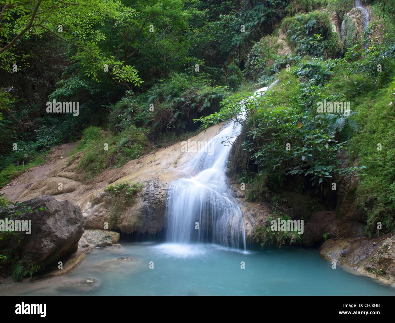 Erawan waterfall with emerald color water Stock Photo - Alamy