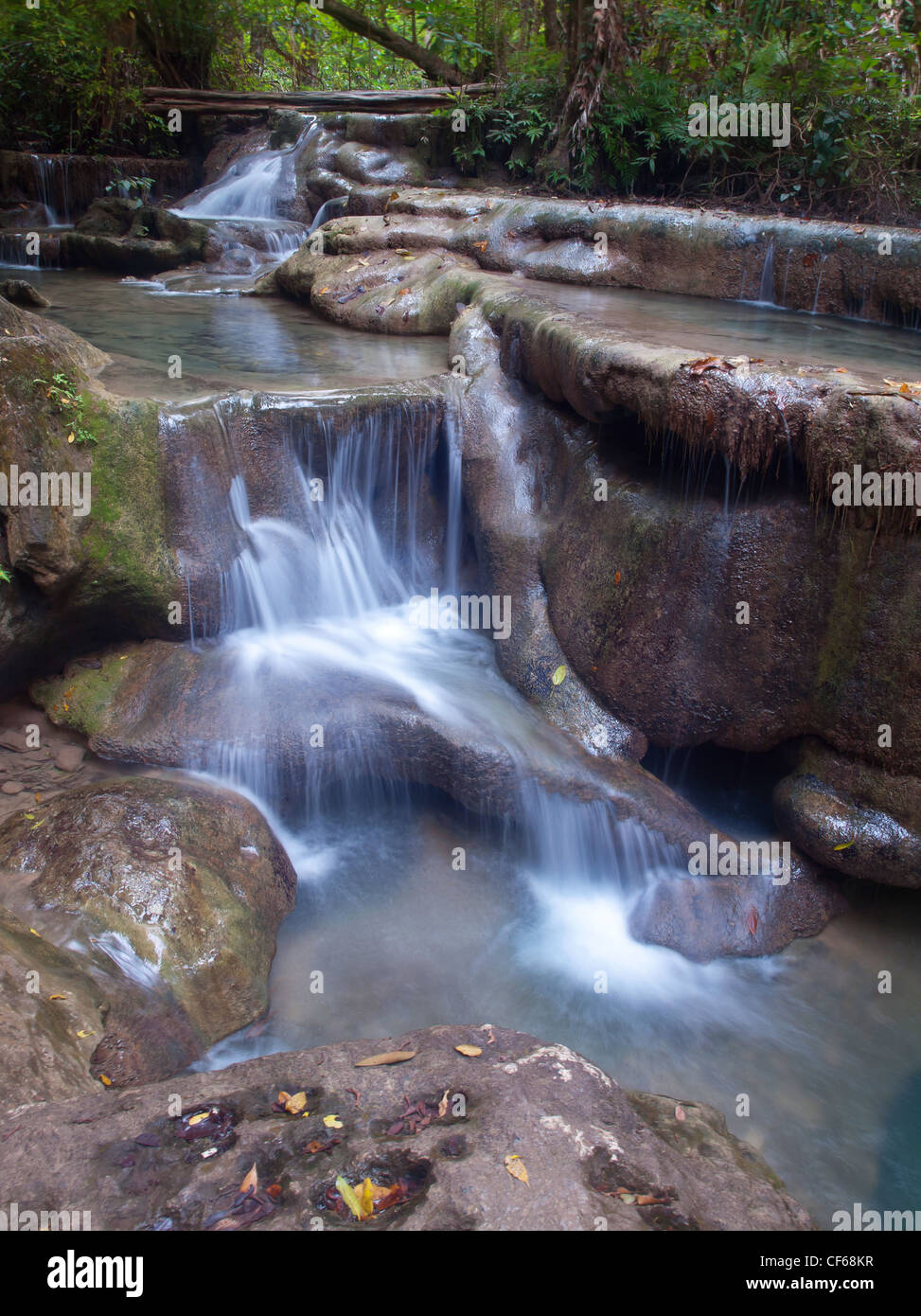 Erawan waterfall with emerald color water Stock Photo - Alamy