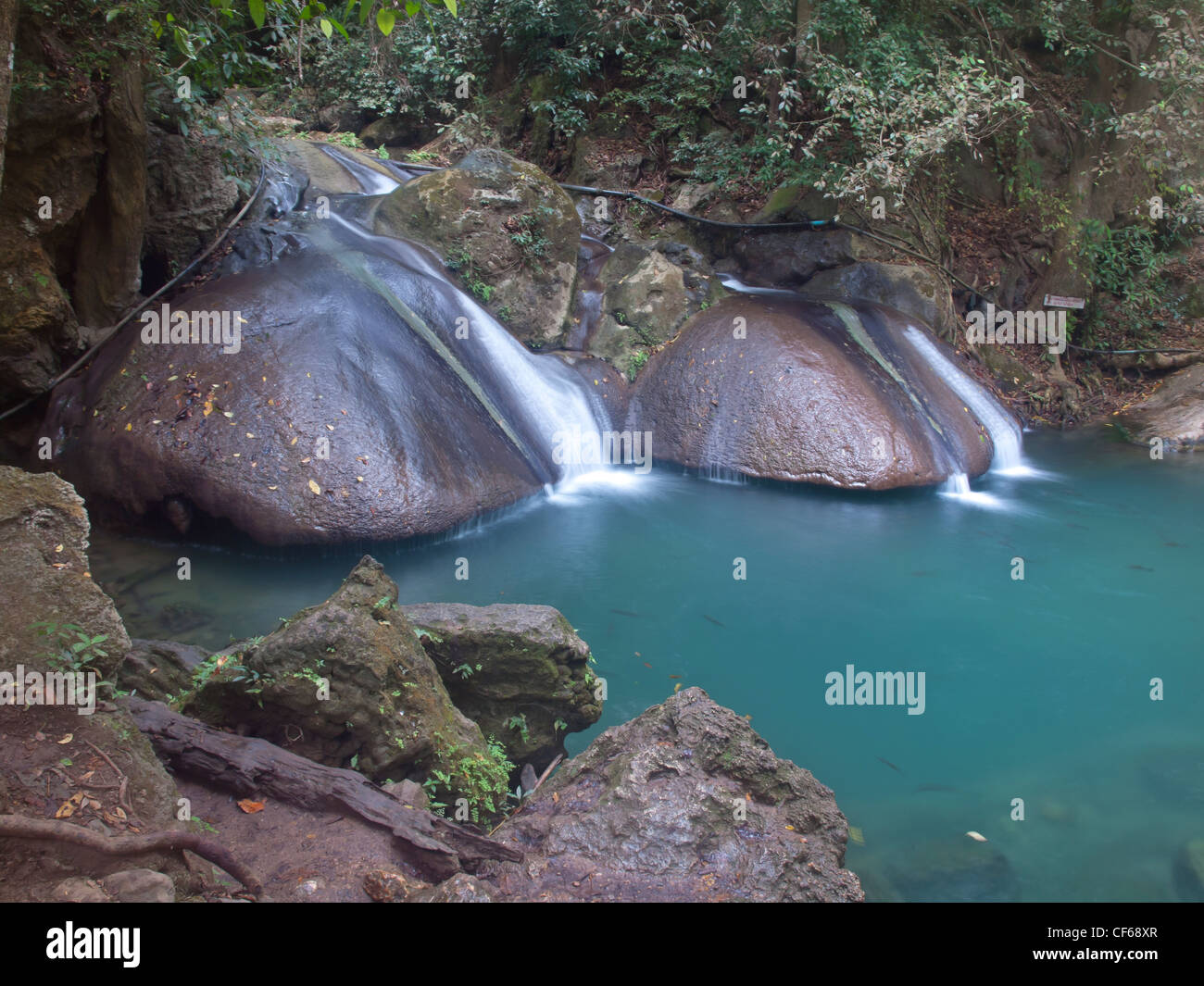 Erawan waterfall with emerald color water Stock Photo - Alamy