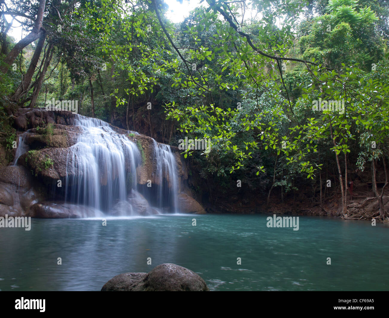 Erawan waterfall with emerald color water Stock Photo - Alamy