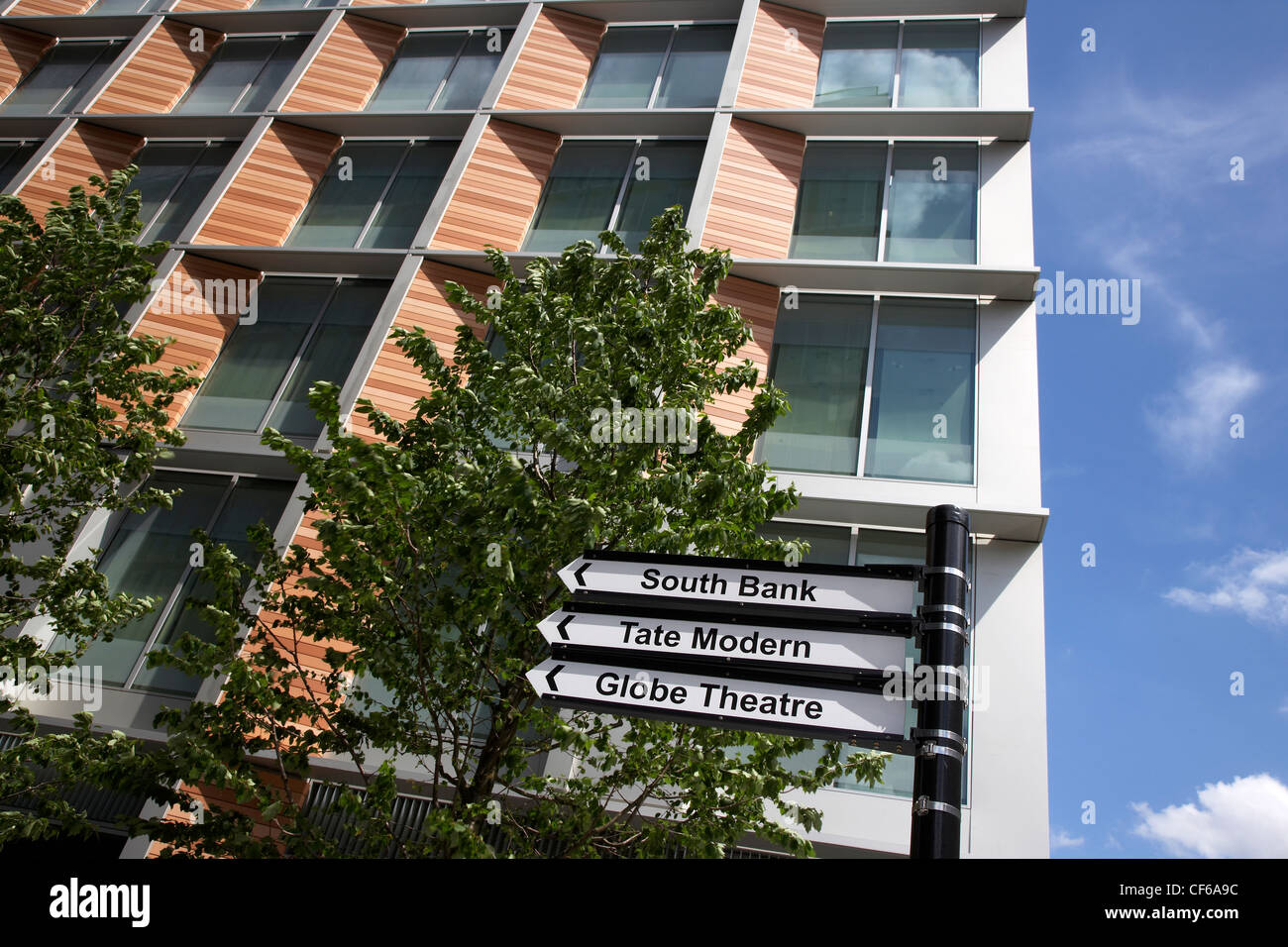 A modern building behind street signs at Bankside in London Stock Photo ...