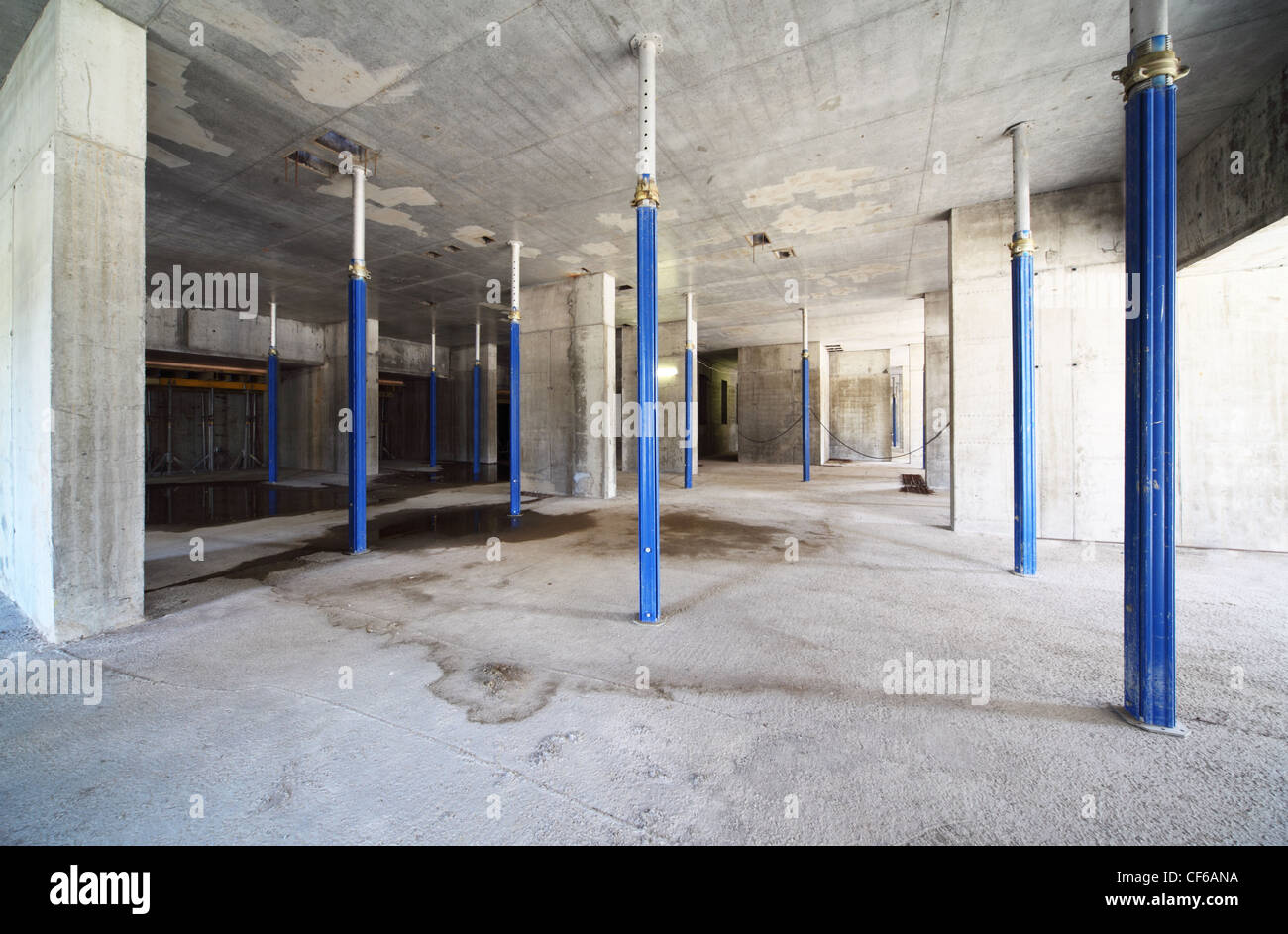 Blue support for concrete ceiling inside unfinished building Stock ...