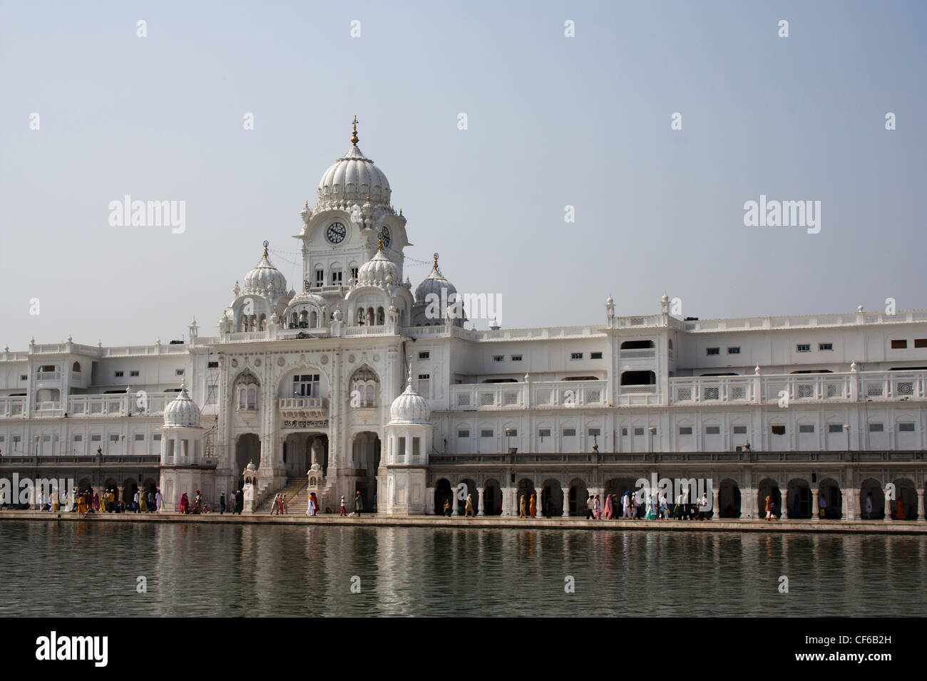Devotees at an outer building of the Golden Temple, also one of the ...