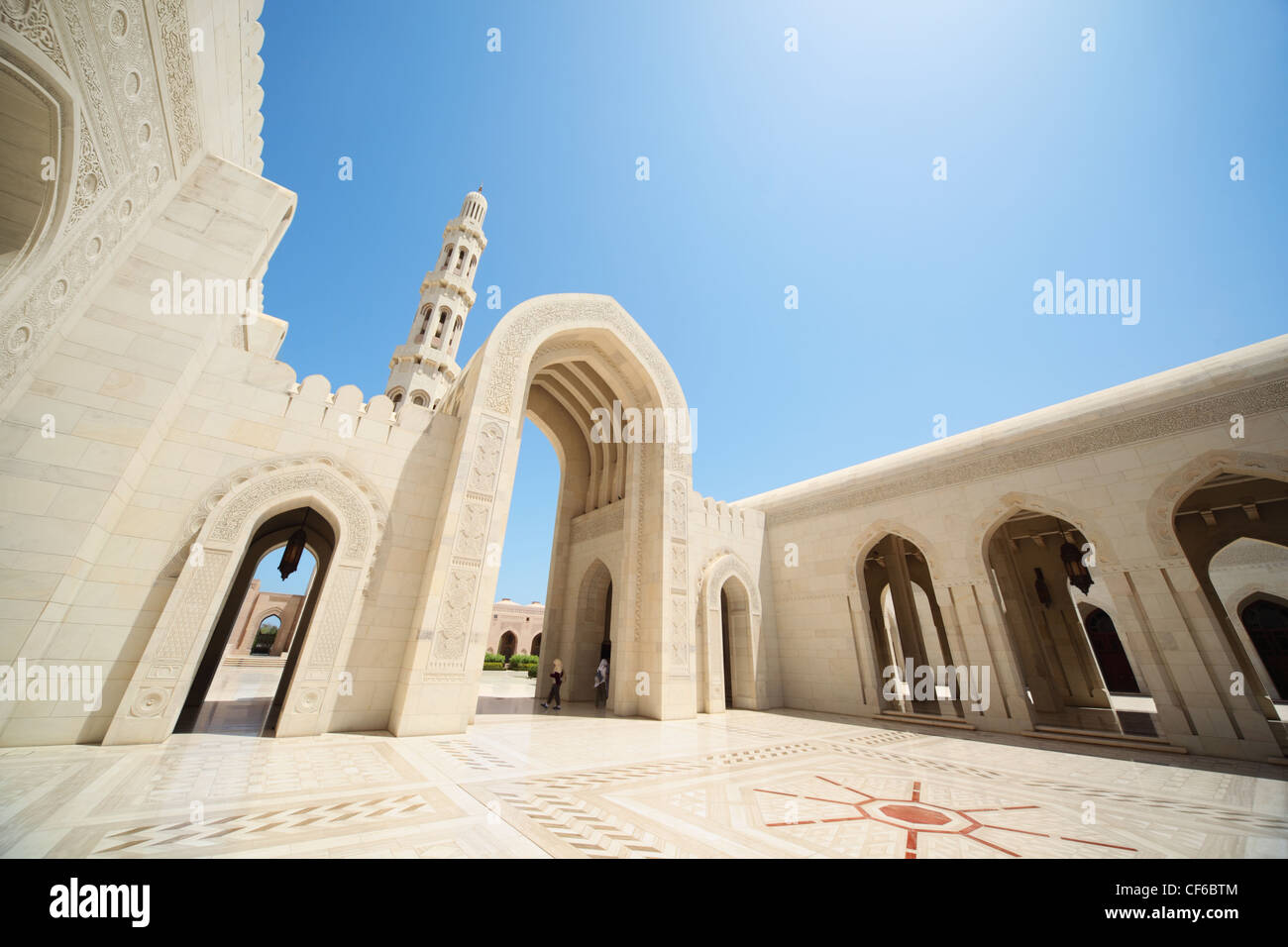 beautiful architecture inside Grand Mosque in Oman. arcs, tower Stock ...