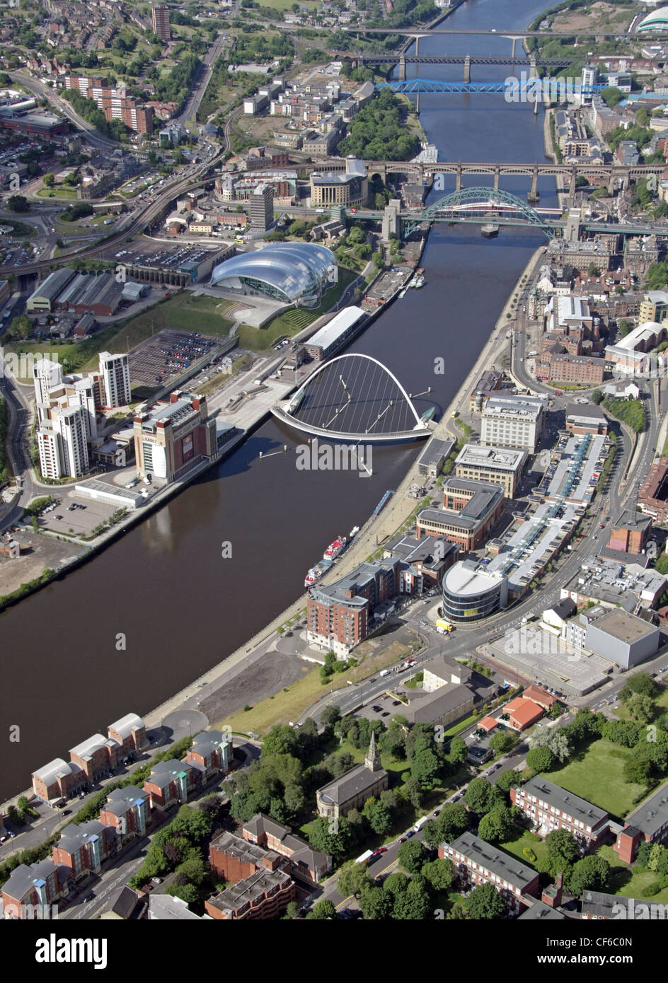 aerial view of the River Tyne with the Gateshead Millennium Bridge mid ...