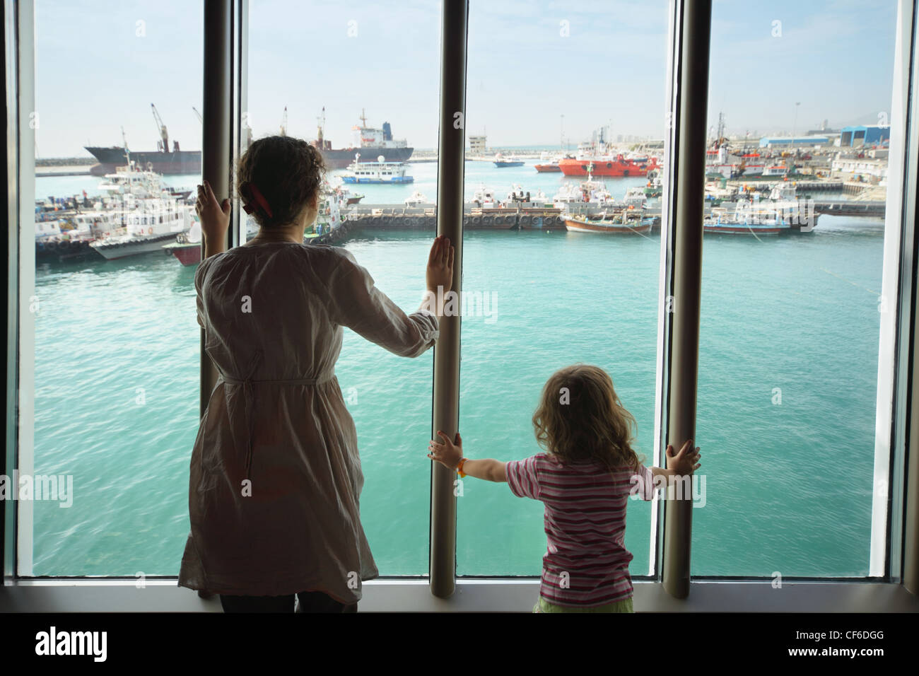 Woman smiling port ships hi-res stock photography and images - Alamy