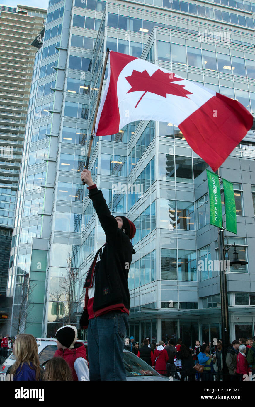 Canadian man wave flag hi-res stock photography and images - Alamy