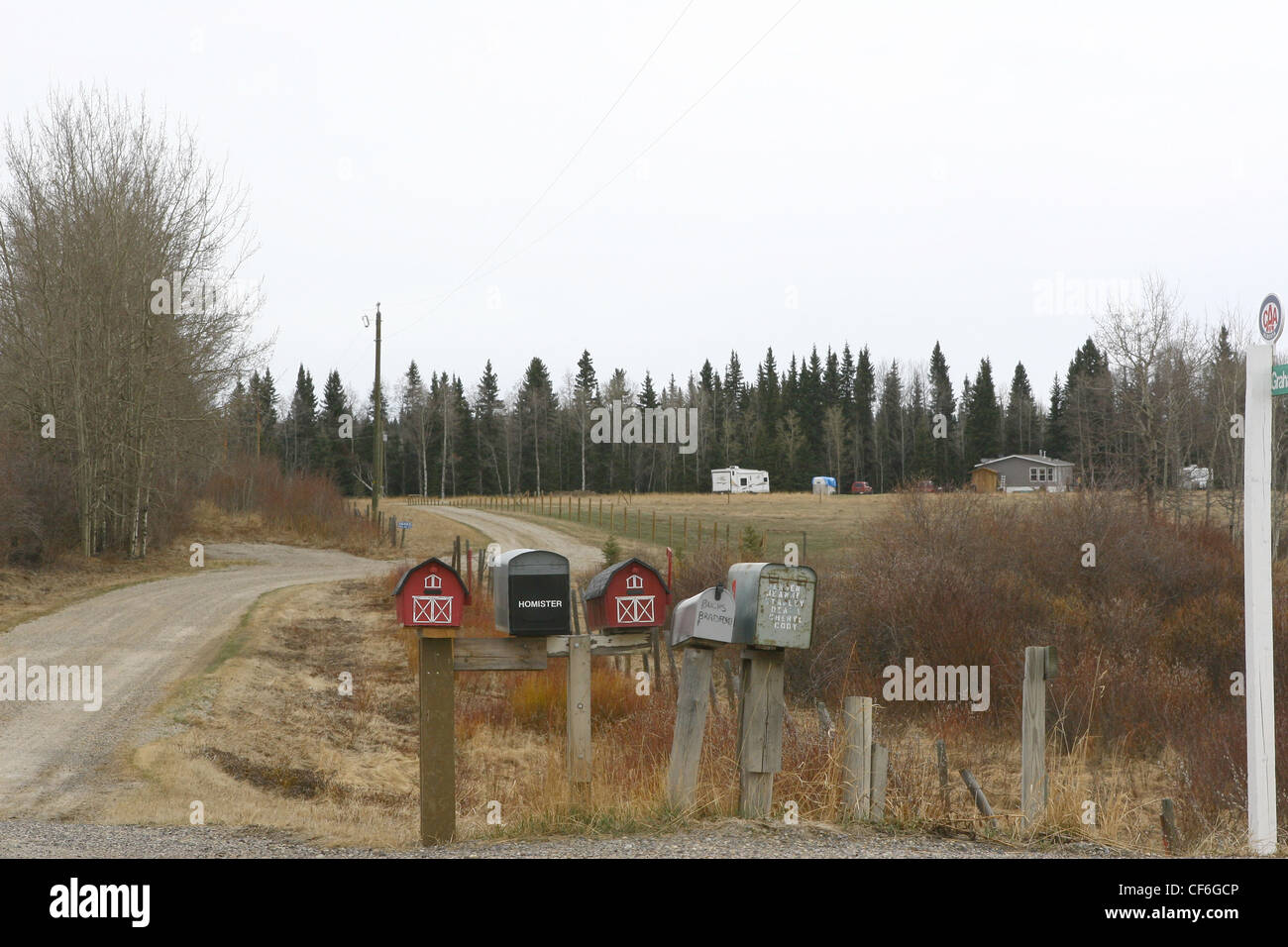 Mail boxes beside the driveway in a rural community Stock Photo - Alamy