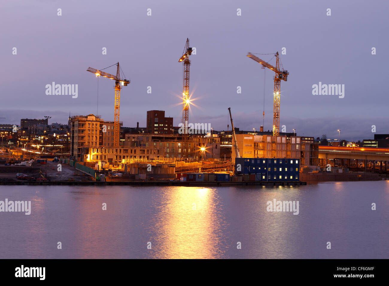 Construction cranes at Kalasatama building project of Helsinki, Finland ...