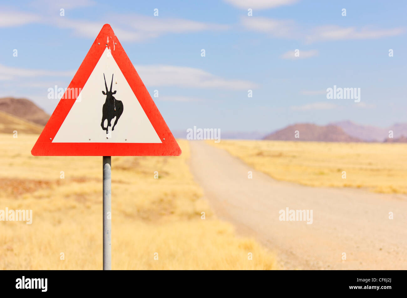 Gemsbok crossing sign along a gravel road. Namibia Stock Photo - Alamy