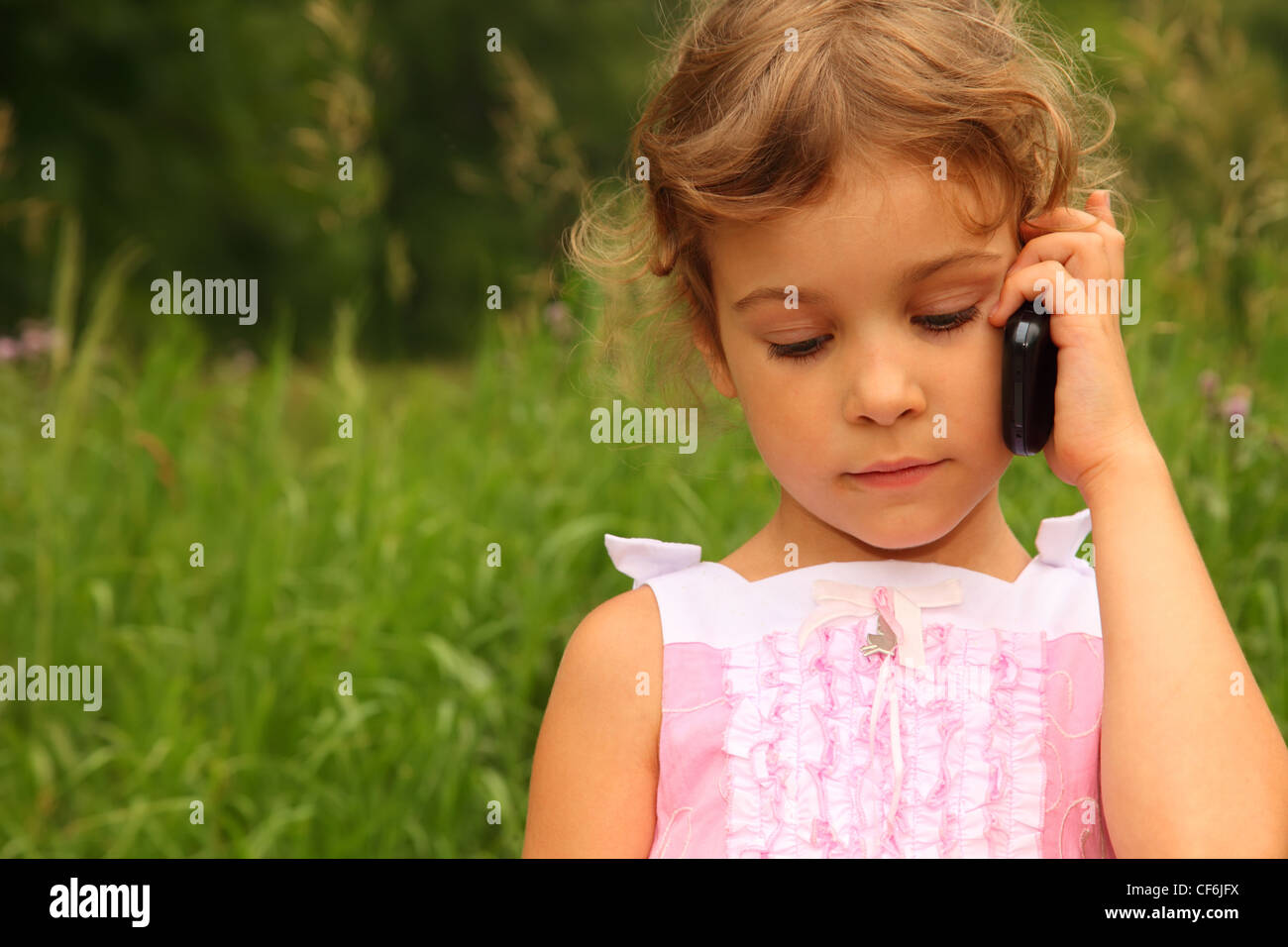 Girl Walking Alone Cell Phone High Resolution Stock Photography and ...