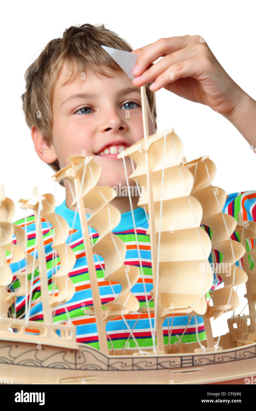 Young boy model ship hi-res stock photography and images - Alamy