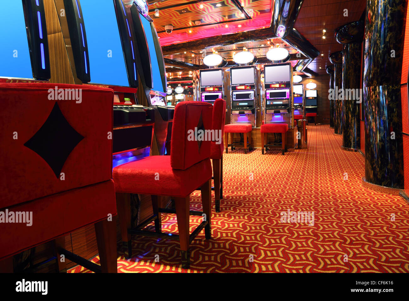modern empty casino hall with game machines, side view Stock Photo - Alamy