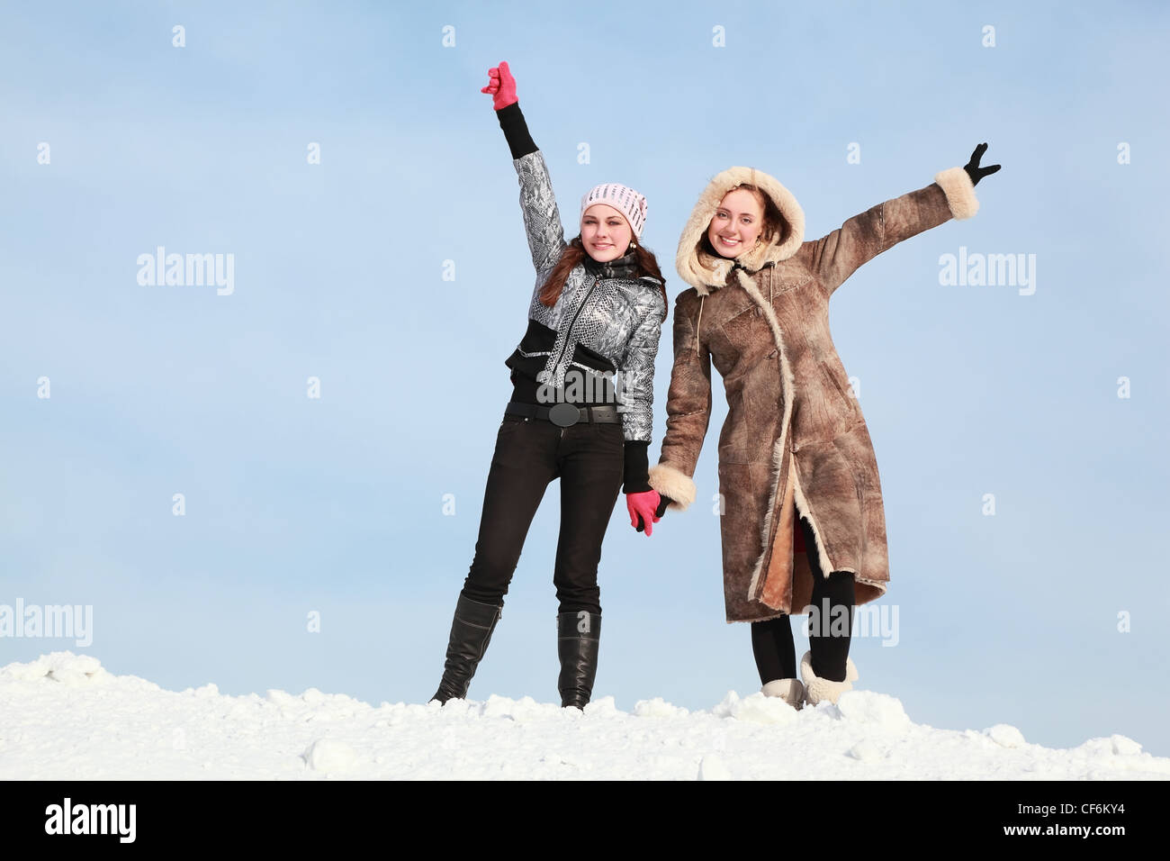 Two girls stand hi-res stock photography and images - Alamy