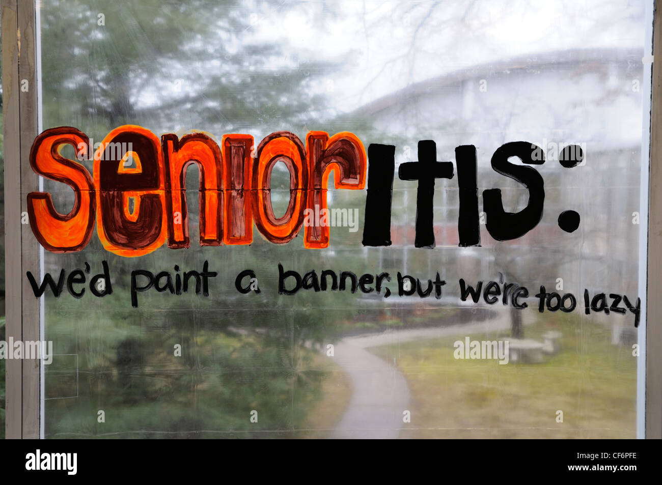 Humorous banner painted by high school seniors Stock Photo - Alamy