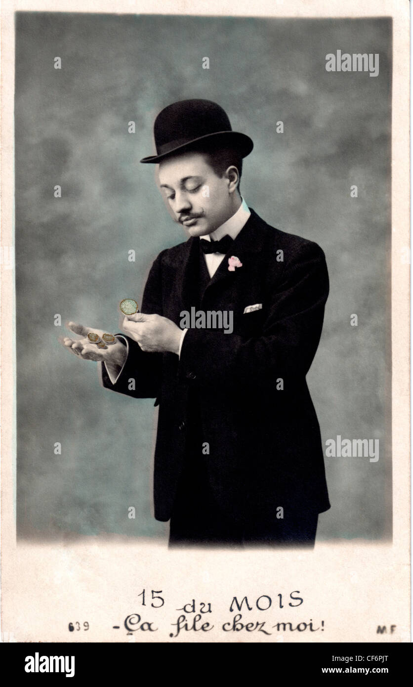 A vintage photo of a man wearing a suit and top hat counting his money ...