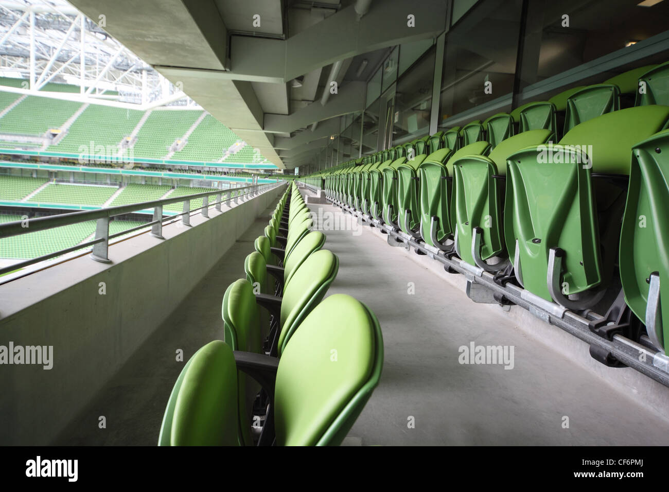 DUBLIN JUNE 10 Many rows green plastic folding seats big empty stadium ...
