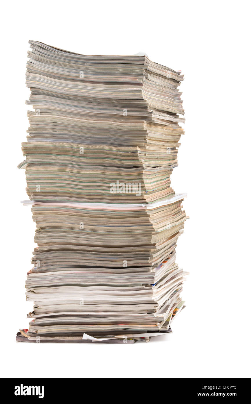 Large stack of magazines on white background Stock Photo - Alamy