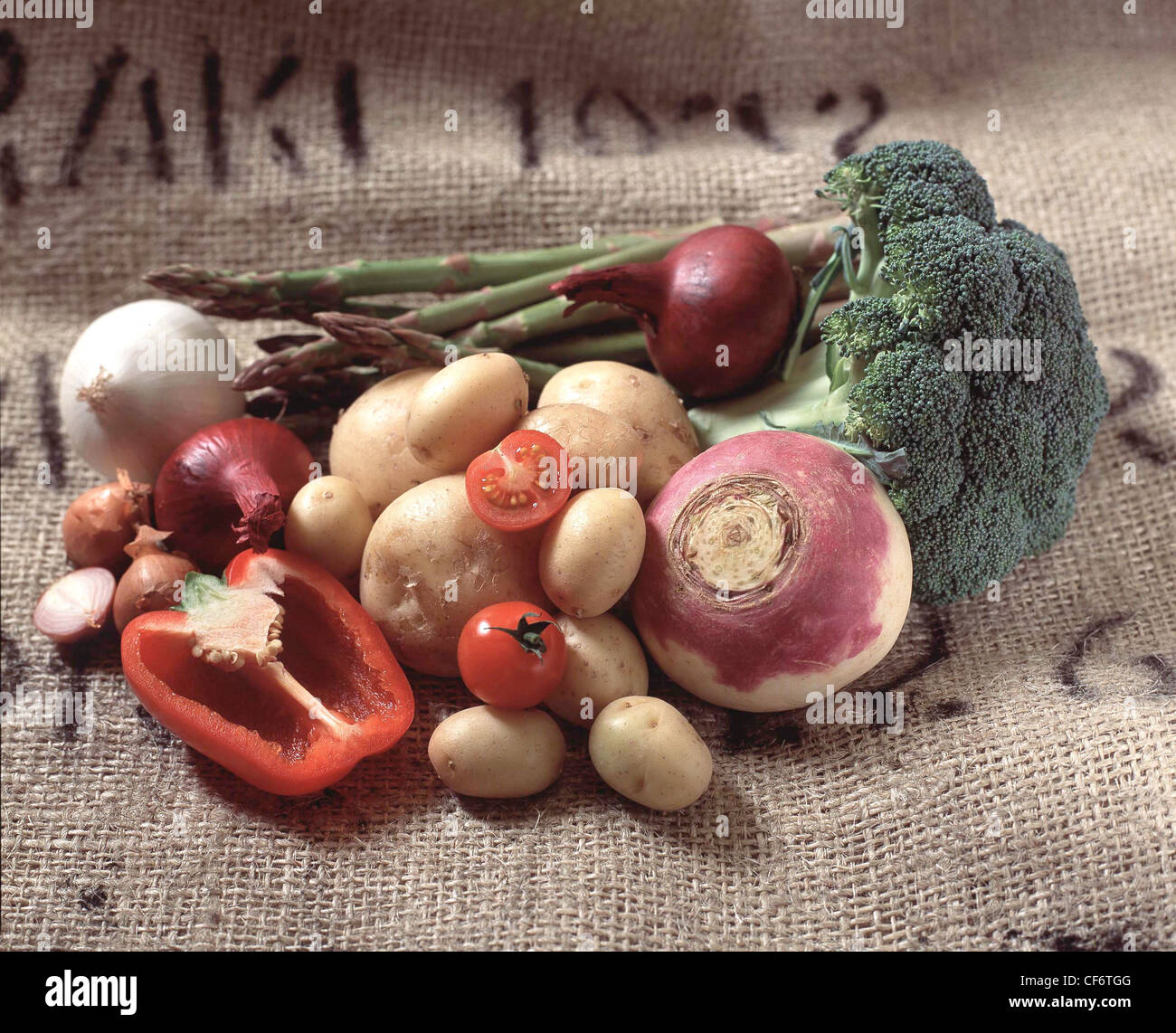 A selection of mixed vegetables including tomatoes asparagus turnip new ...