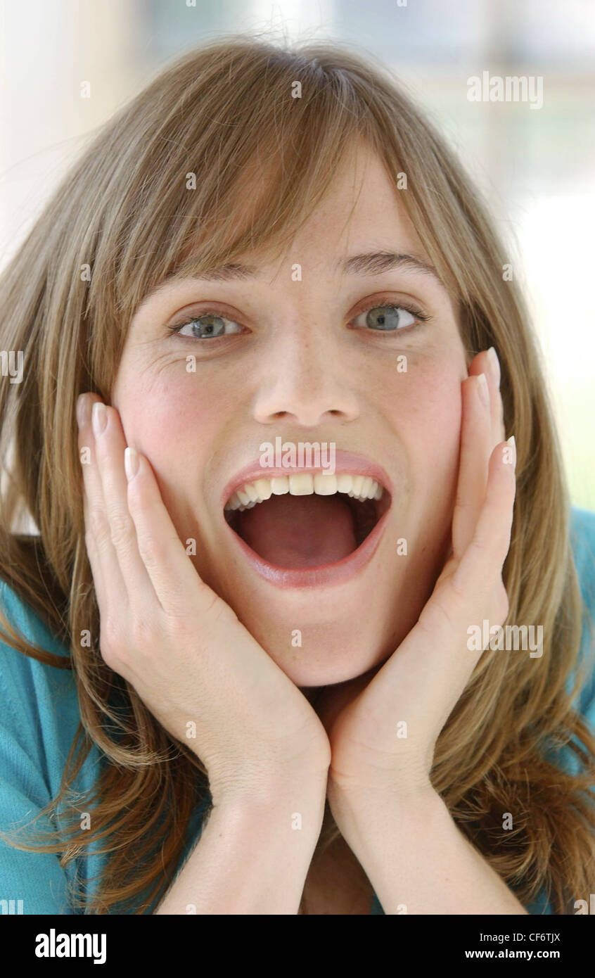 Female long light brown hair and fringe wearing subtle make up and ...