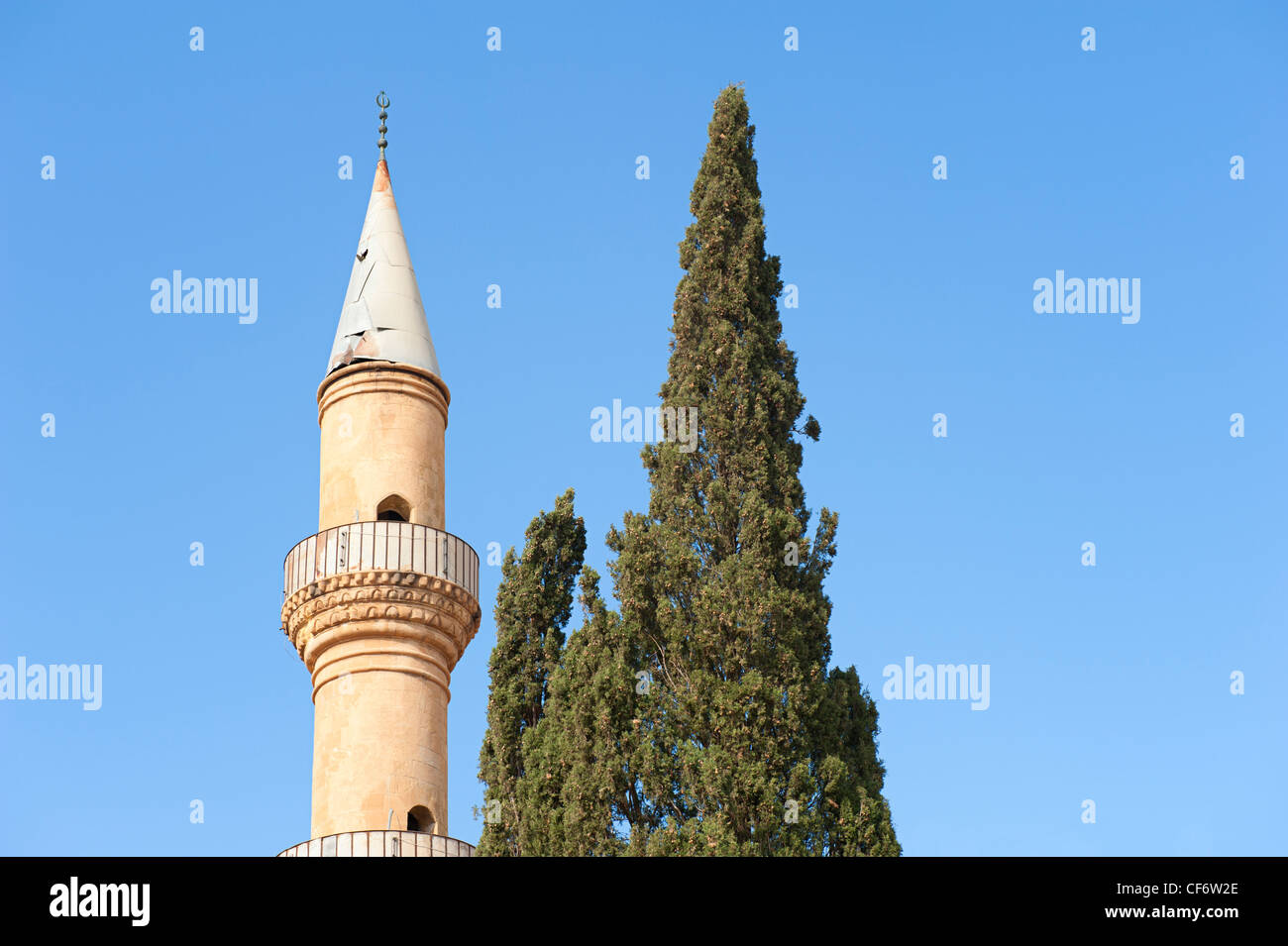 Minaret near tree in Cyprus Stock Photo - Alamy