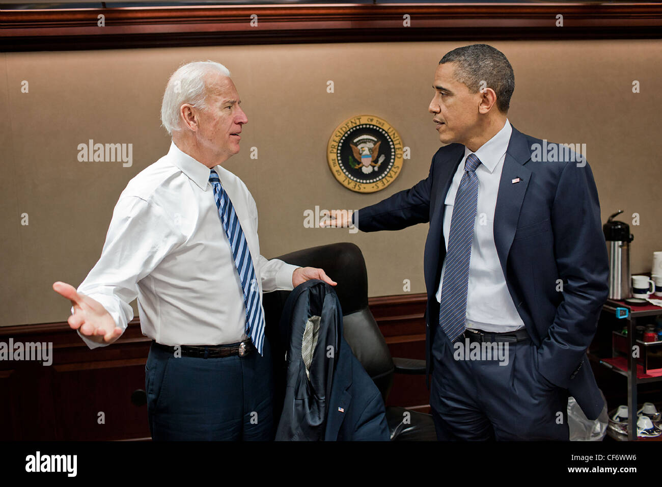 President Barack Obama talks with Vice President Joe Biden following a ...