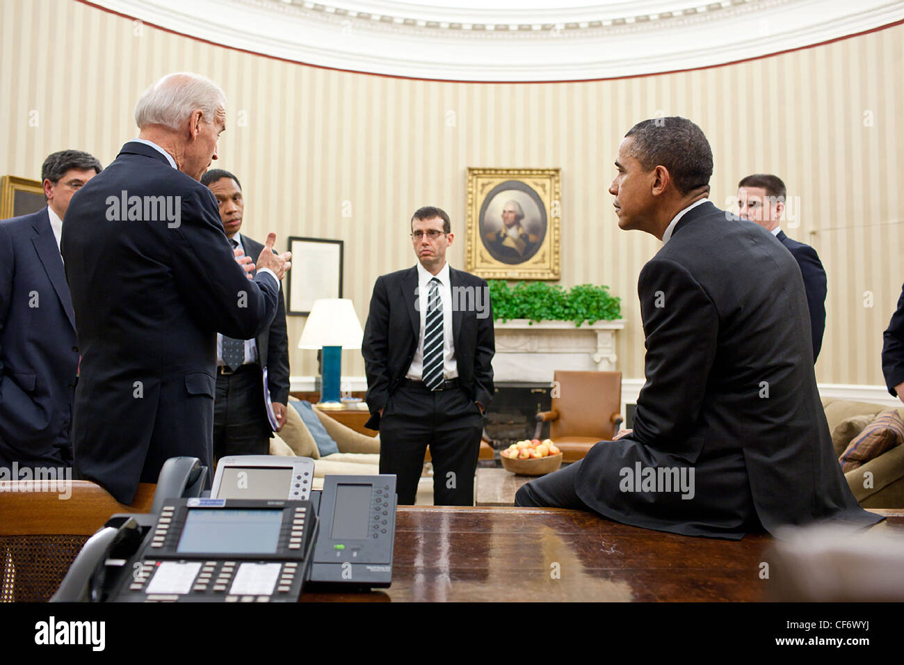 President Barack Obama and Vice President Joe Biden meet with staff in ...