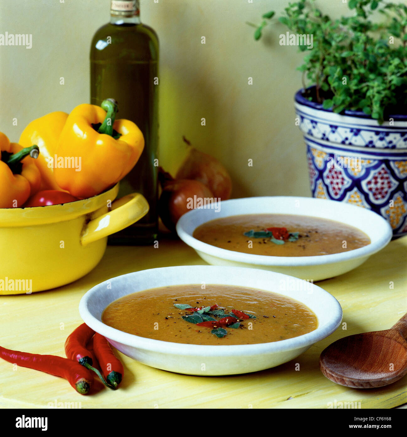 Homemade Soups Pepper soup chilli, served in two white bowls, fresh ...