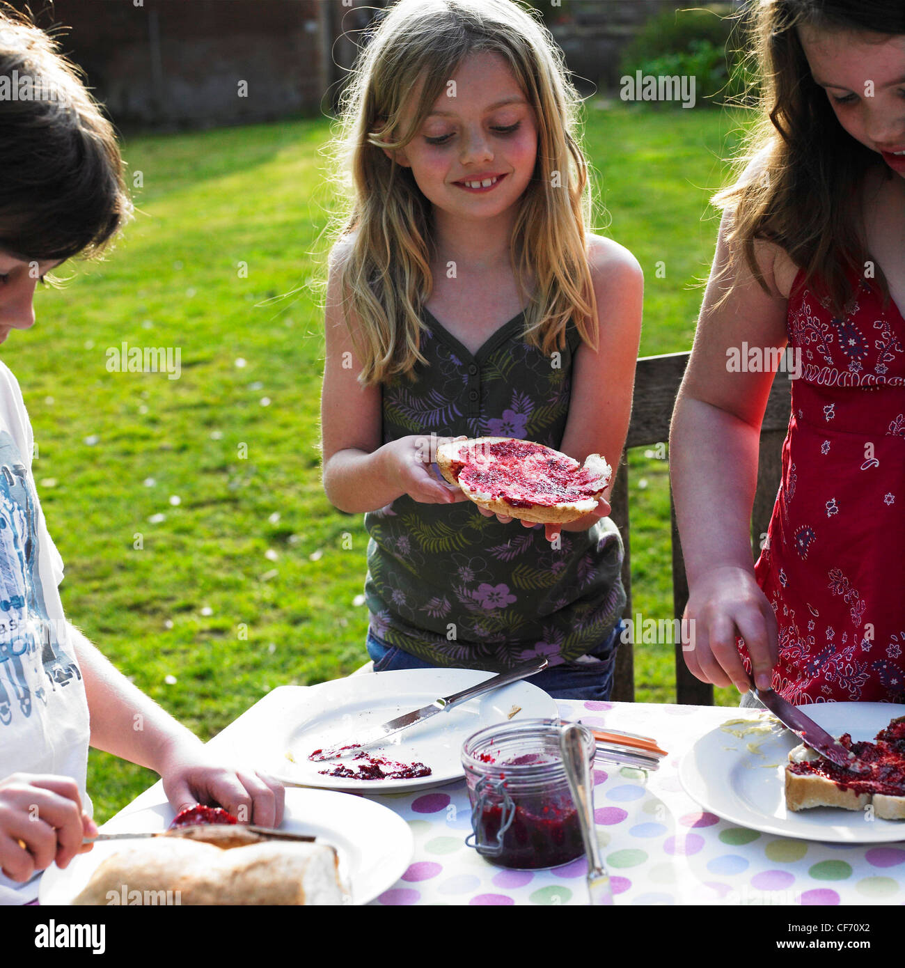 Group boys eating sandwiches hi-res stock photography and images - Alamy