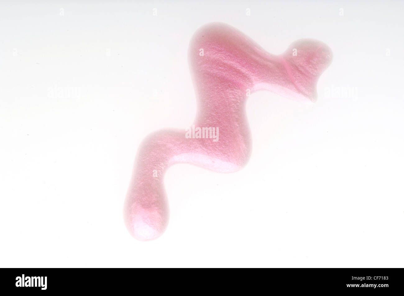 Drizzle of pale pink nail polish Stock Photo - Alamy