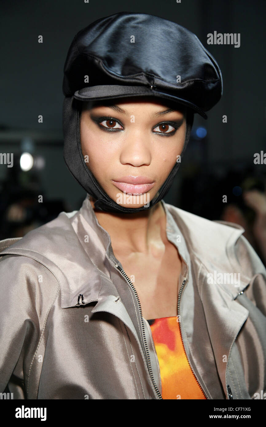 Celine Backstage Paris Autumn Winter Model wearing beige shiny satin ...