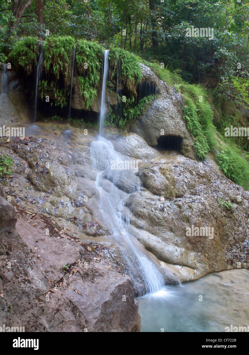 Erawan waterfall with emerald color water Stock Photo - Alamy
