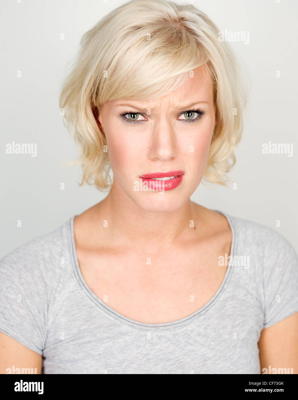 Female frowning and about to cry Stock Photo - Alamy