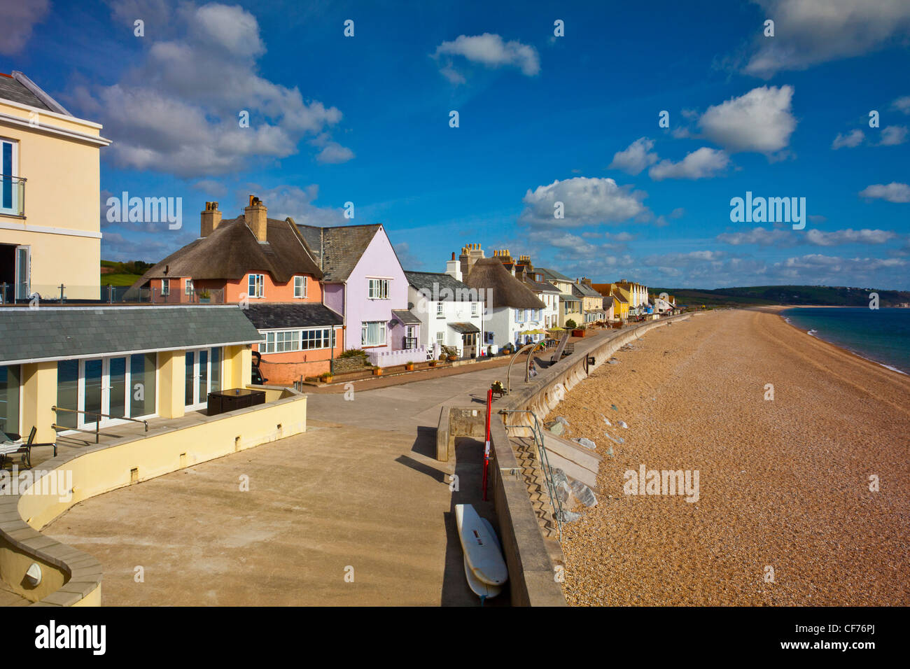 The long shingle beach and line of colourful houses at Torcross on the ...
