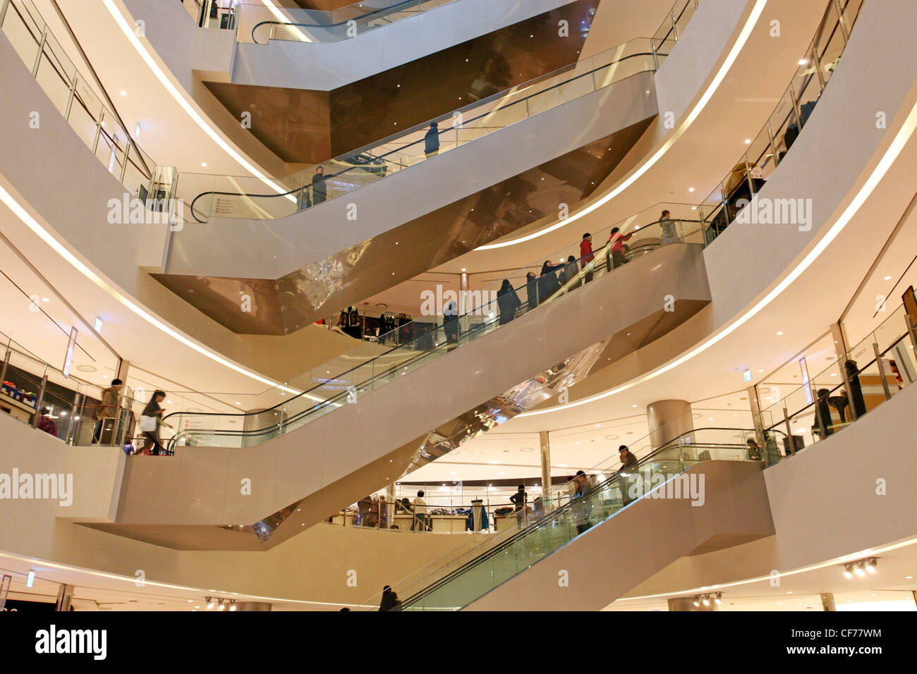 Escalators in the atrium of Shinsegae, the world's largest department ...