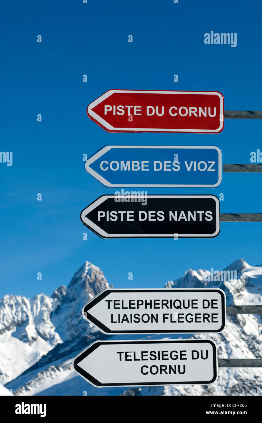 Leftward directional signs to ski slopes at Planpraz, skiing area ...