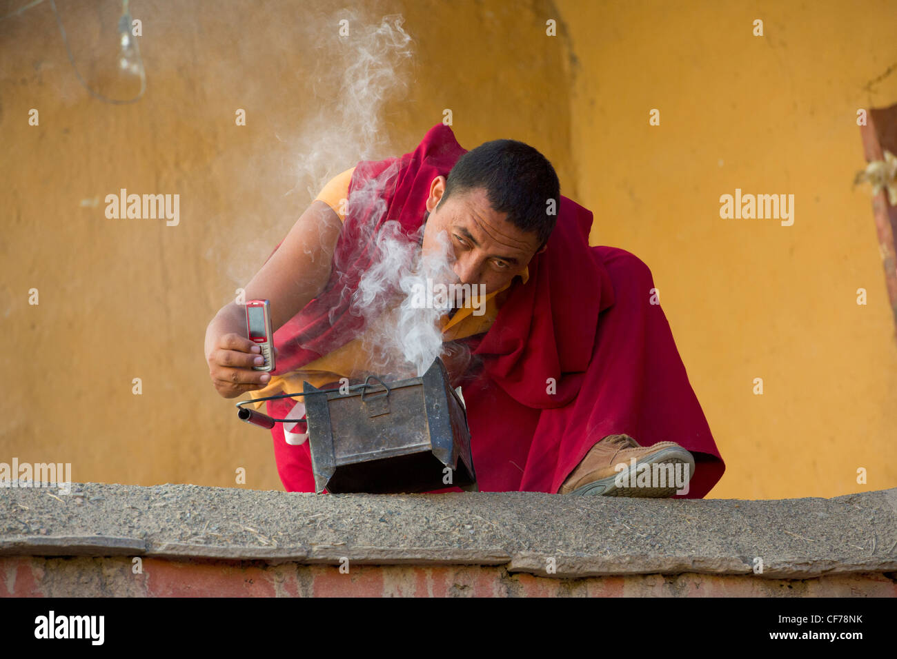 Buddhist monk phone hi-res stock photography and images - Alamy