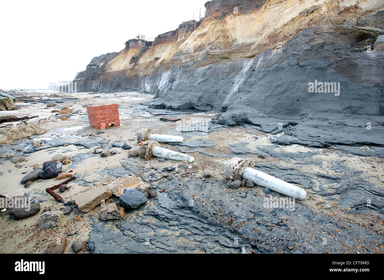 A Manhole with it`s cover lay on the beach after falling from the ...