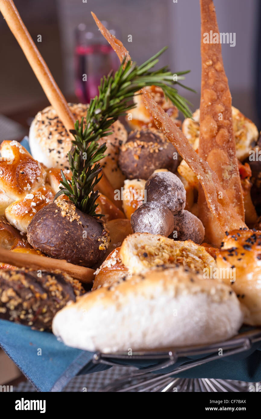 Luxury bread basket display in an a la carte restaurant Stock Photo - Alamy