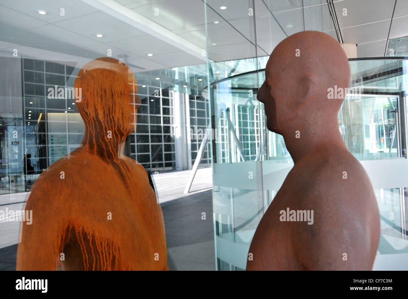 Anthony Gormley statue London Euston Road statues Stock Photo - Alamy