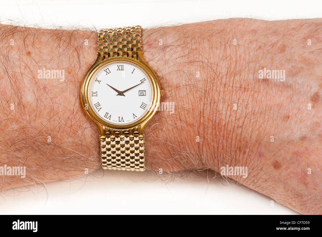 Gold watch hi-res stock photography and images - Alamy