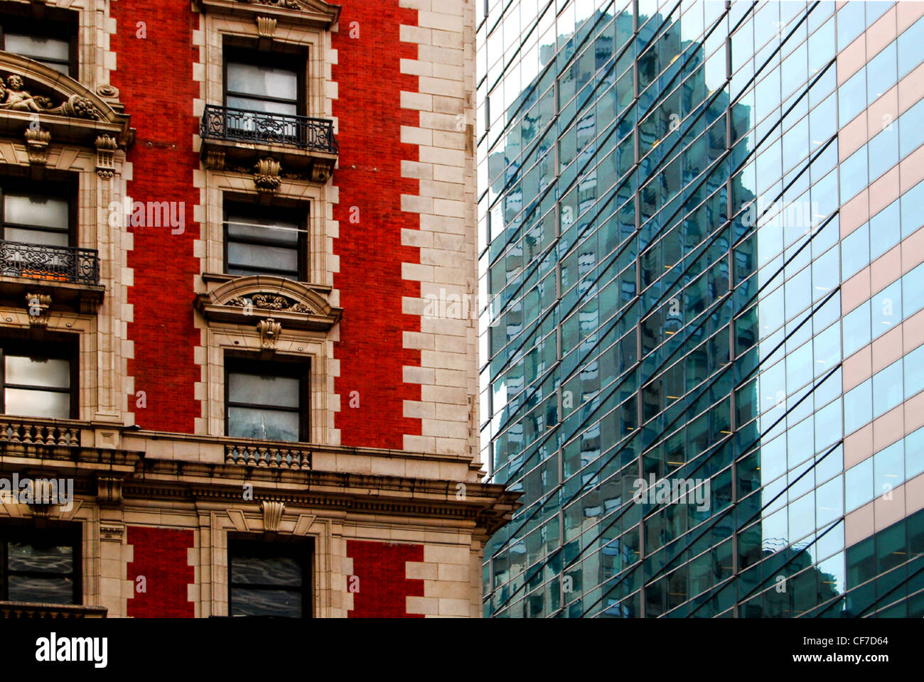Two buidlings of different architectural styleson Times Square in ...