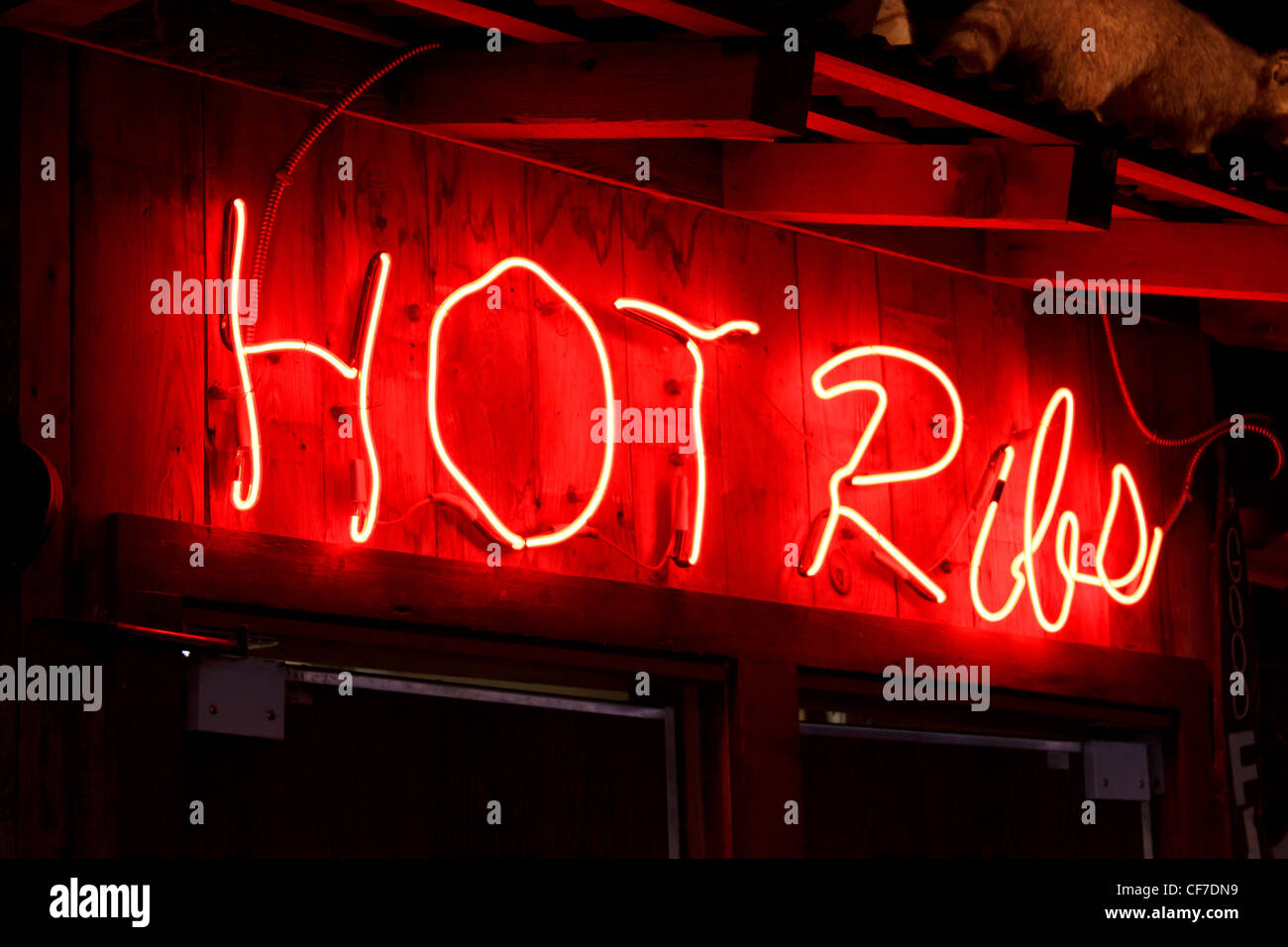Hot ribs neon sign Stock Photo - Alamy