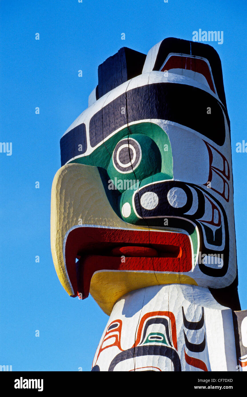 Figures and symbols of importance to First Nation peoples are carved ...