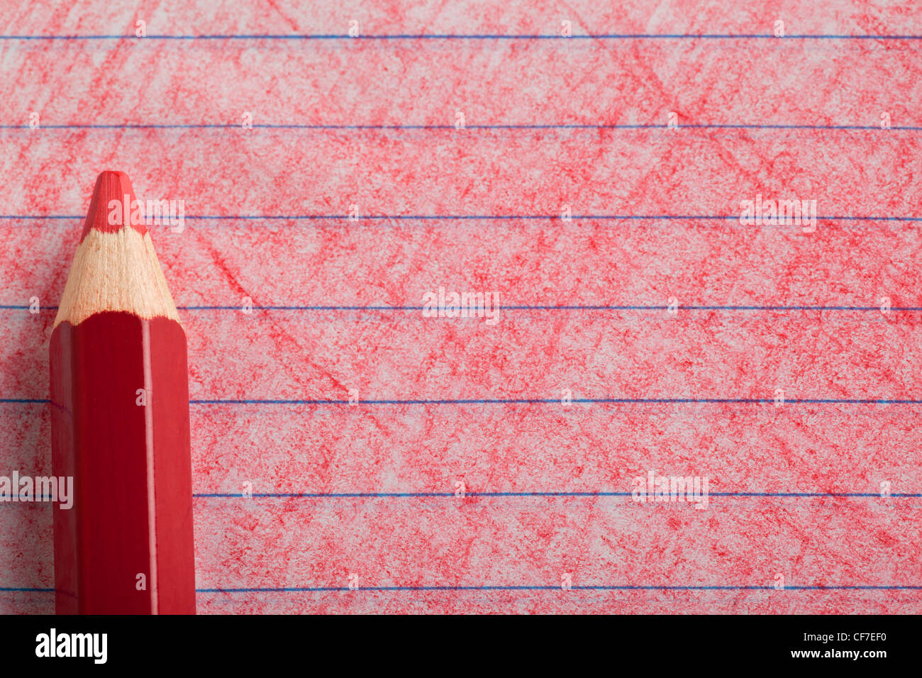 Red color pencil with coloring on a piece of paper Stock Photo - Alamy